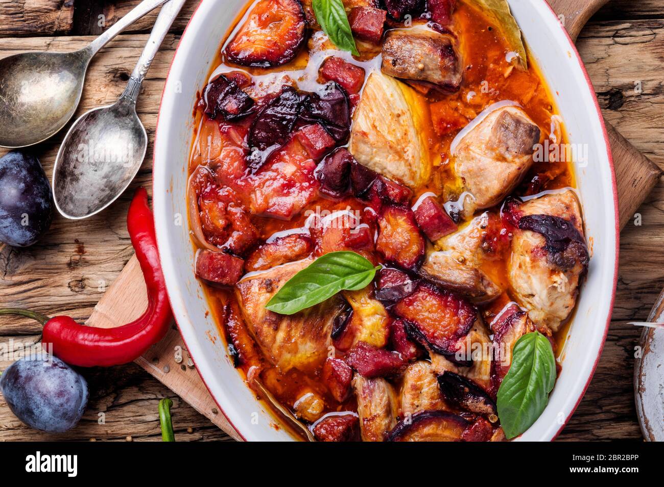Beef with plum. Beef stew with ripe plums Stock Photo - Alamy
