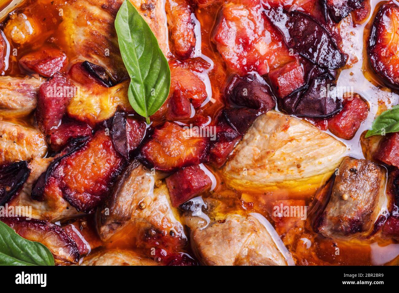 Beef with plum. Beef stew with ripe plums Stock Photo - Alamy