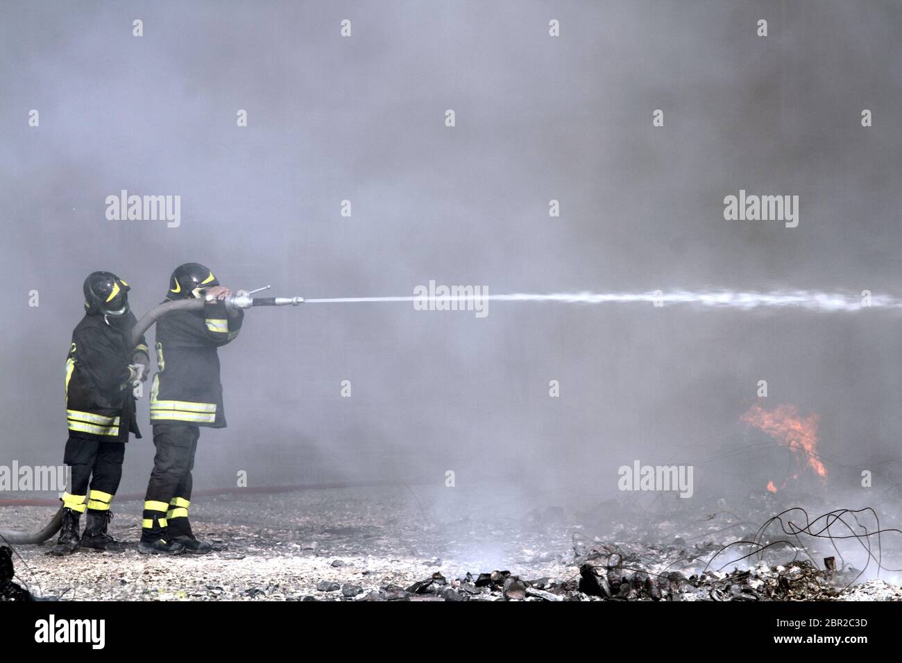 firefighter in the smoke fire Stock Photo - Alamy