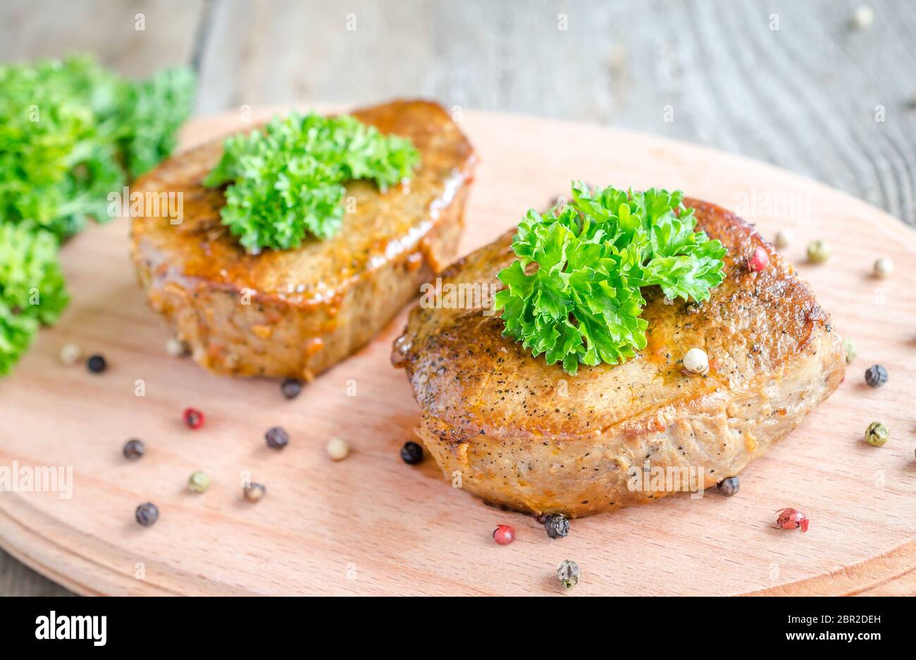 Angus Beef Steaks With Roasted Tomato Sauce Stock Photo - Alamy