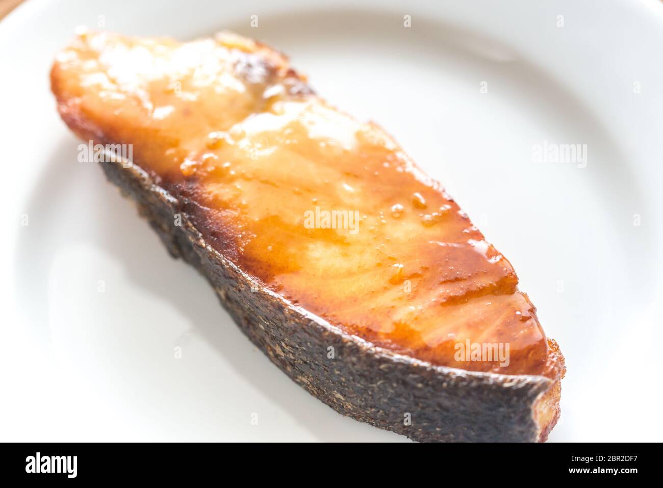Roasted fish steak with lemon Stock Photo - Alamy