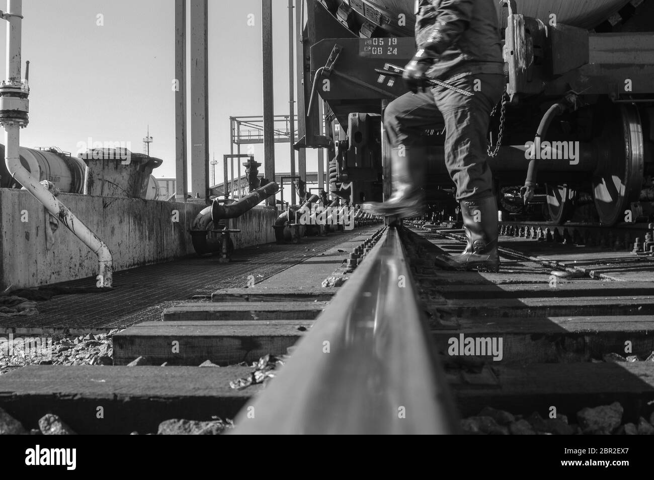 Railroad in a industrial area .Train delivering oil or gas Stock Photo ...