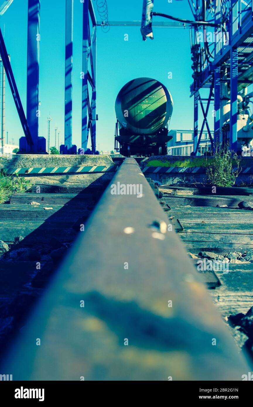 Railroad in a industrial area .Train delivering oil or gas Stock Photo ...