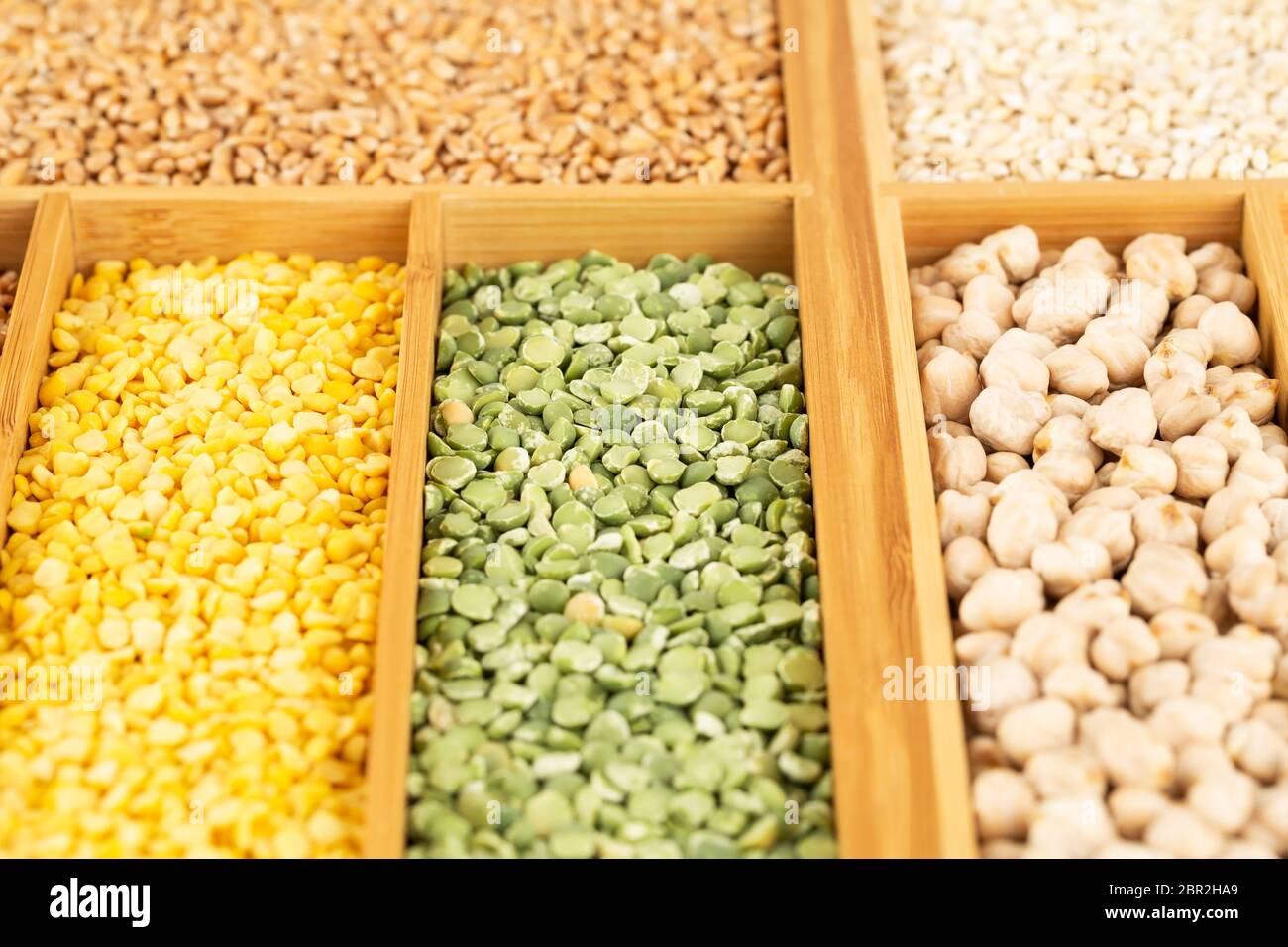 The collection of different groats, peas, wheat and chickpeas in the ...