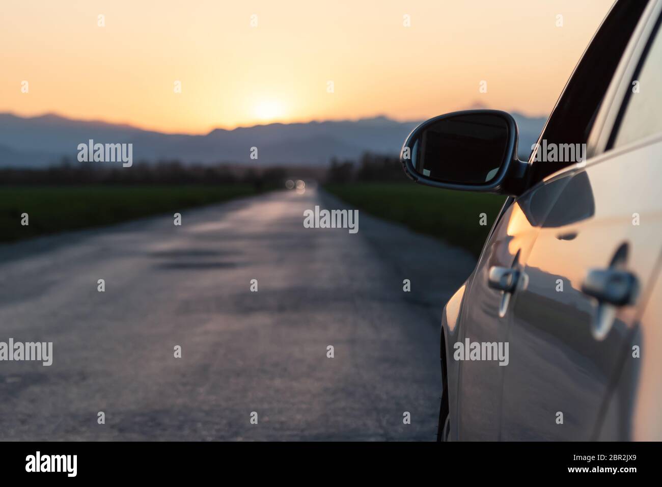 evening road heading to sunset horizon view from car Stock Photo - Alamy
