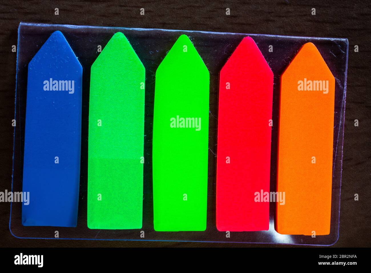 Arrows with luminous color in UV light Stock Photo - Alamy