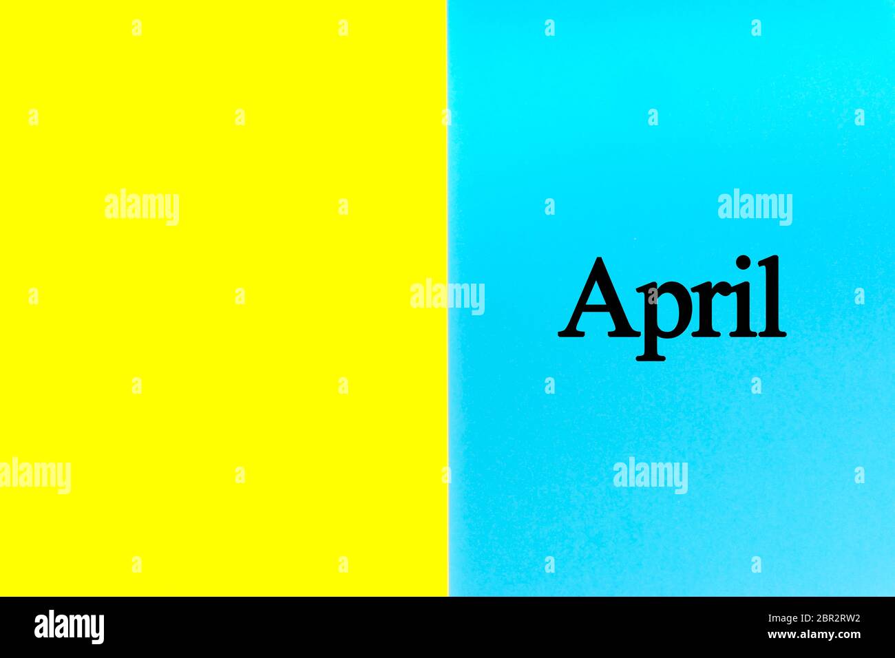 APRIL written words on blue and yellow background. Calendar, Month ...