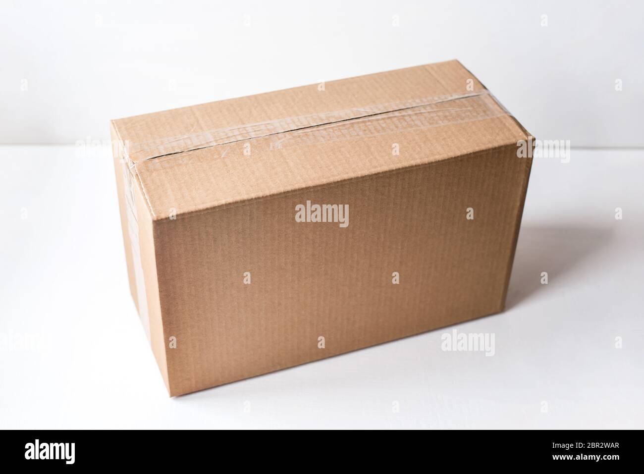Cardboard box on white background Stock Photo - Alamy