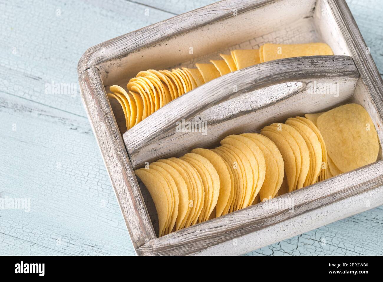 Potato chips in the wooden box Stock Photo - Alamy