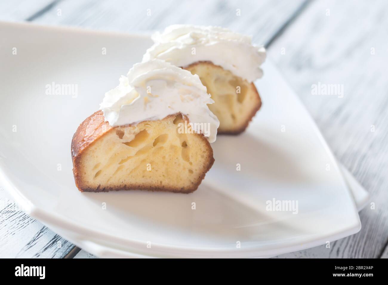 Rum baba on plate hi-res stock photography and images - Alamy