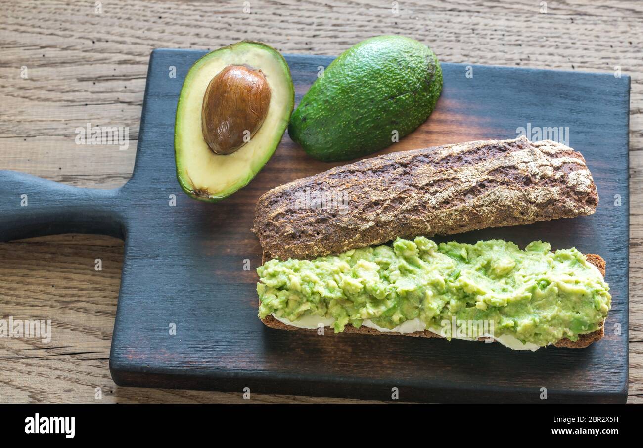 Sandwich with smashed avocado Stock Photo - Alamy