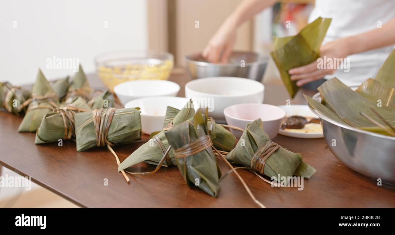 Make of stick rice dumpling Stock Photo - Alamy