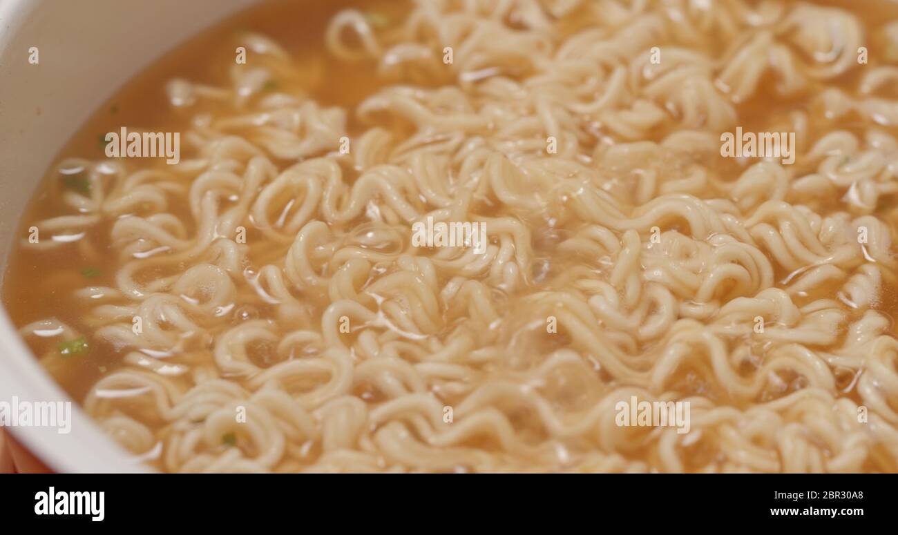 Cooking instant noodles Stock Photo - Alamy