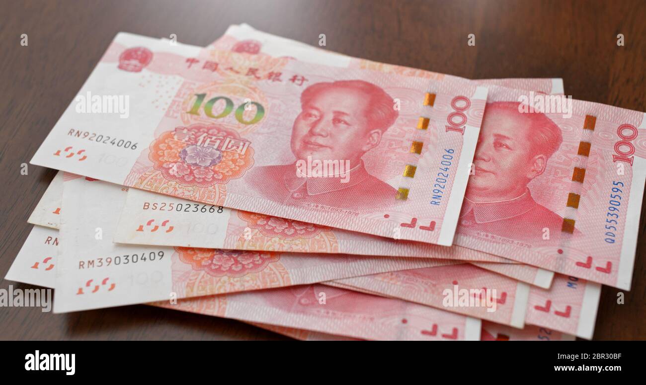 Counting Chinese RMB banknote Stock Photo - Alamy