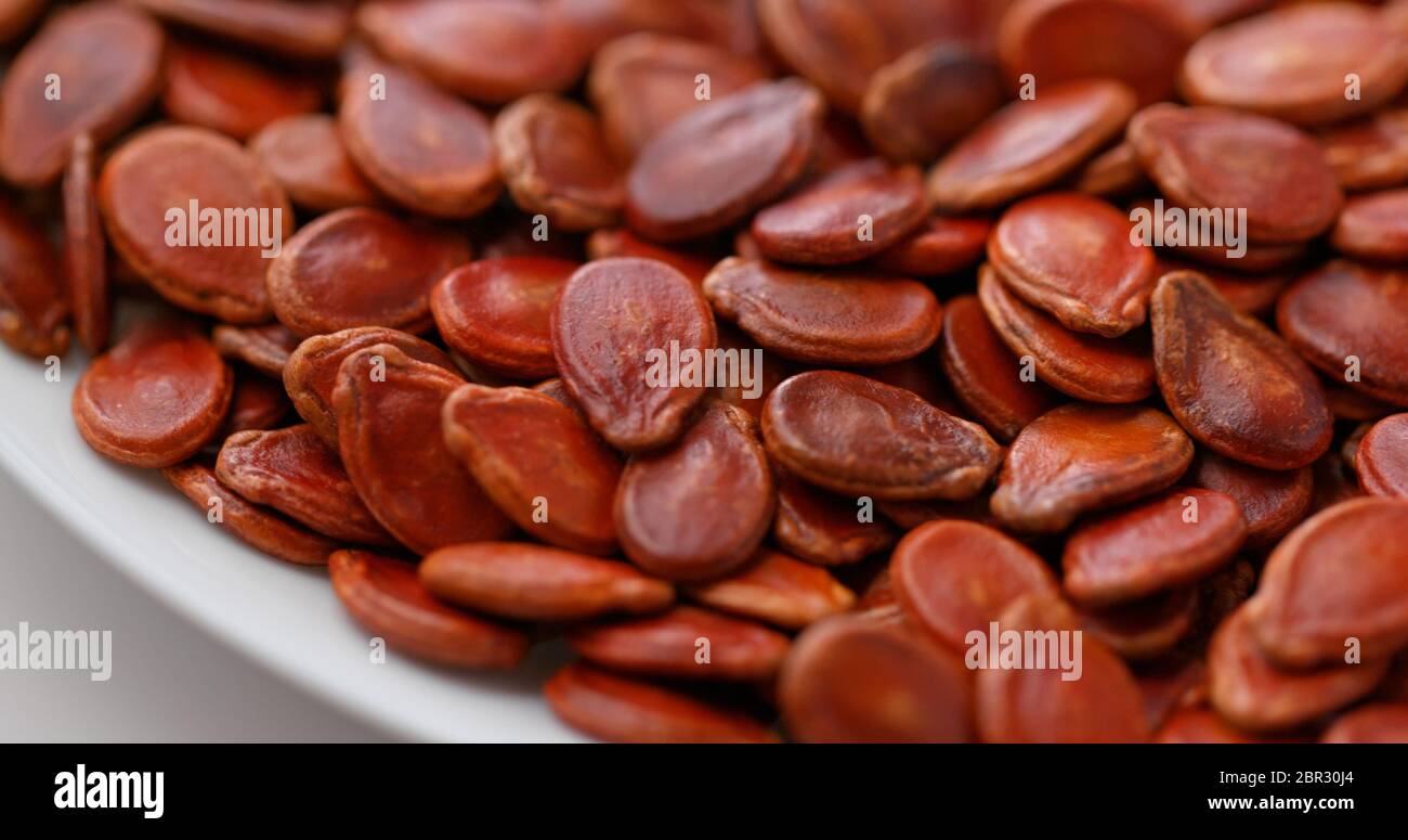 Red dry watermelon seed Stock Photo - Alamy