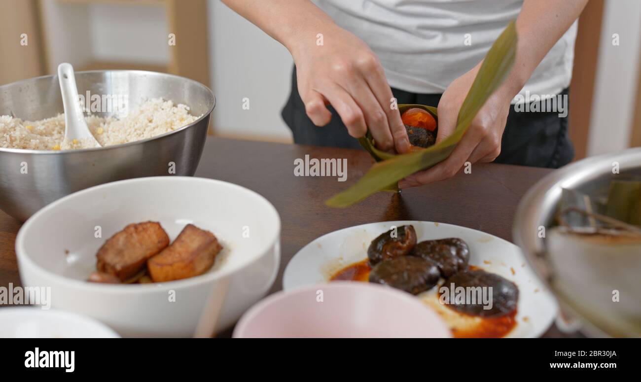 Making process of rice dumpling at home Stock Photo - Alamy