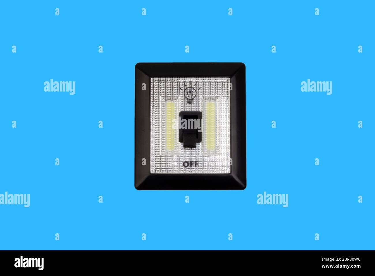 LED Light switch or Magnetic LED switch isolated on blue background ...