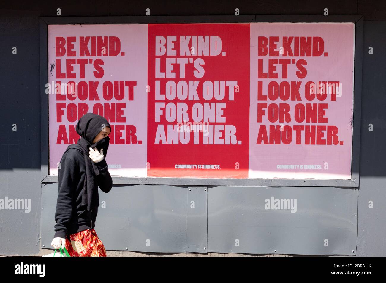 Shawlands, Glasgow, Scotland, UK. 20th May, 2020. a young woman walks ...