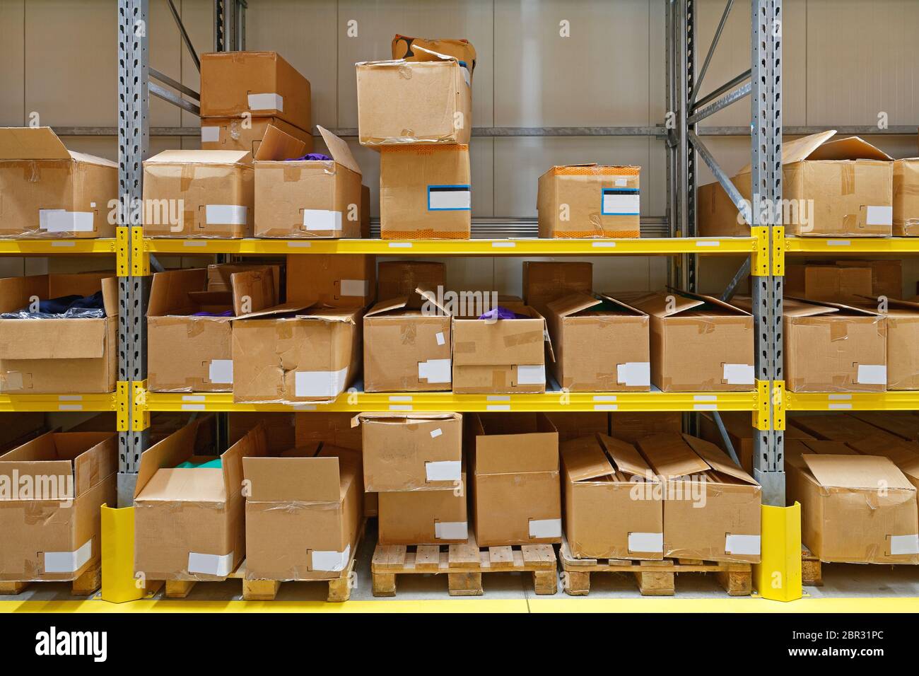Boxes With Goods at Shelf in Storage Room Warehouse Stock Photo - Alamy