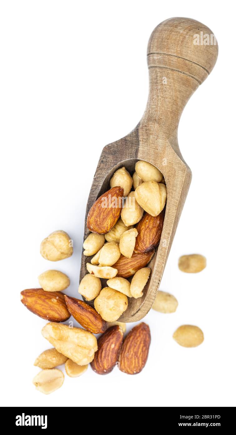 Fresh roasted nuts isolated on white background as close up shot ...