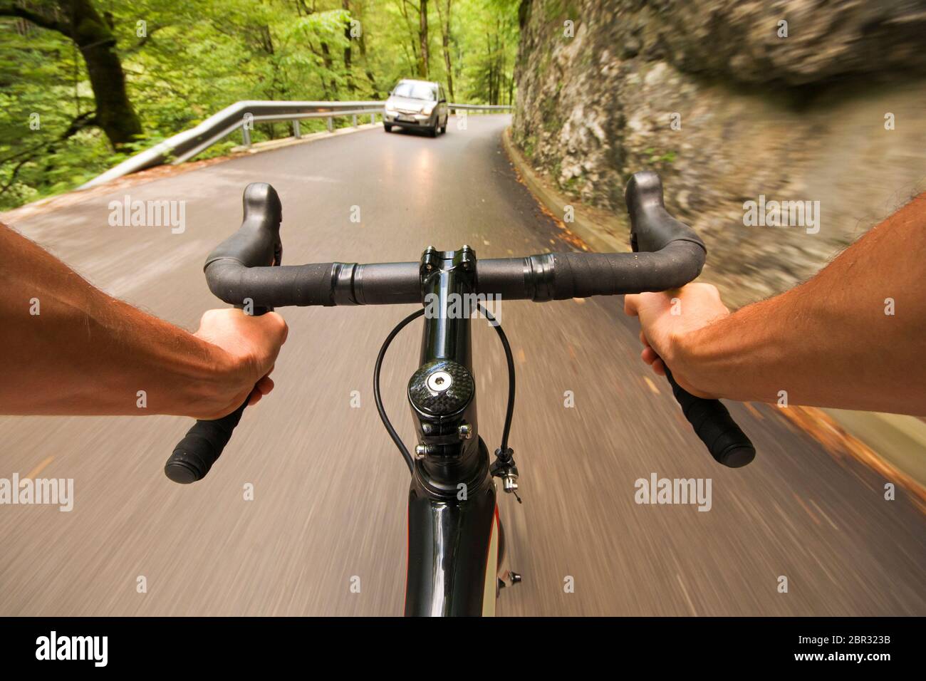 Road cycling wide angle speed shoot in nature. Landscape cycling in ...