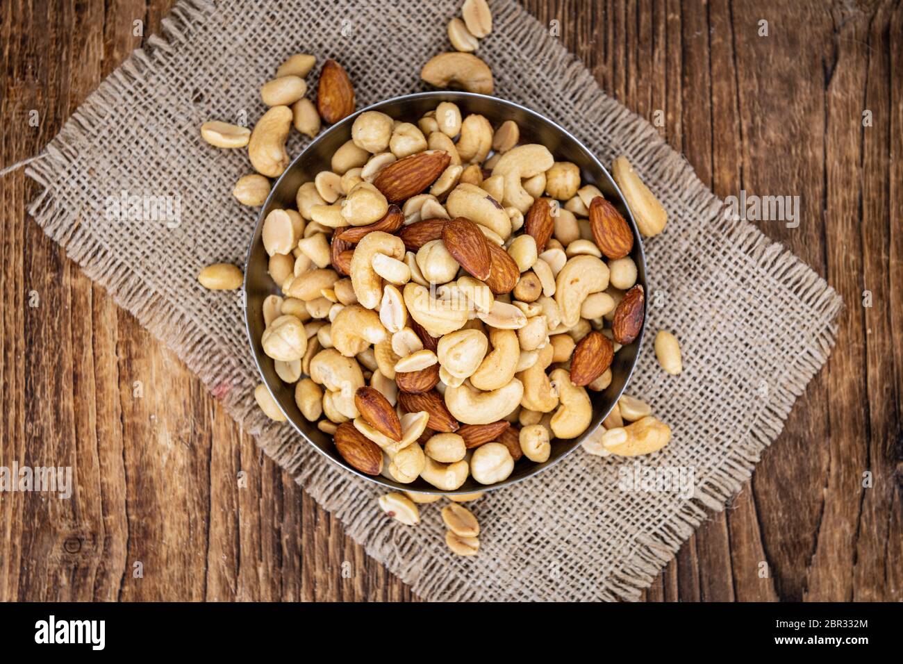 Portion of roasted nuts as detailed close up shot (selective focus ...