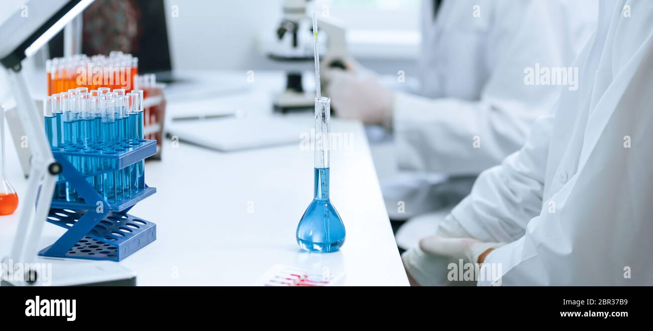 close up. a group of scientists work in a modern laboratory Stock Photo ...