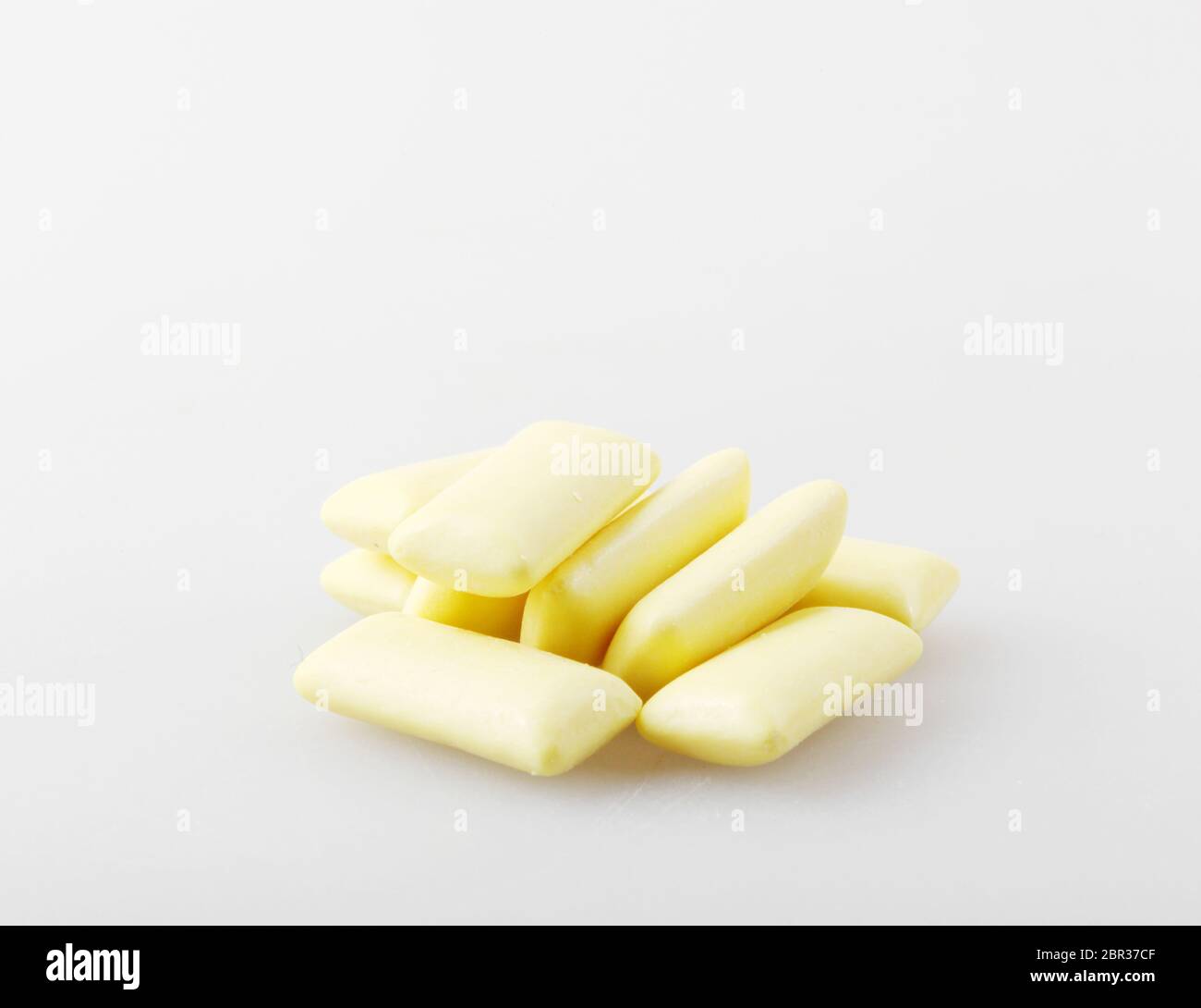 Yellow Chewing Gum Isolated On White Background Stock Photo - Alamy