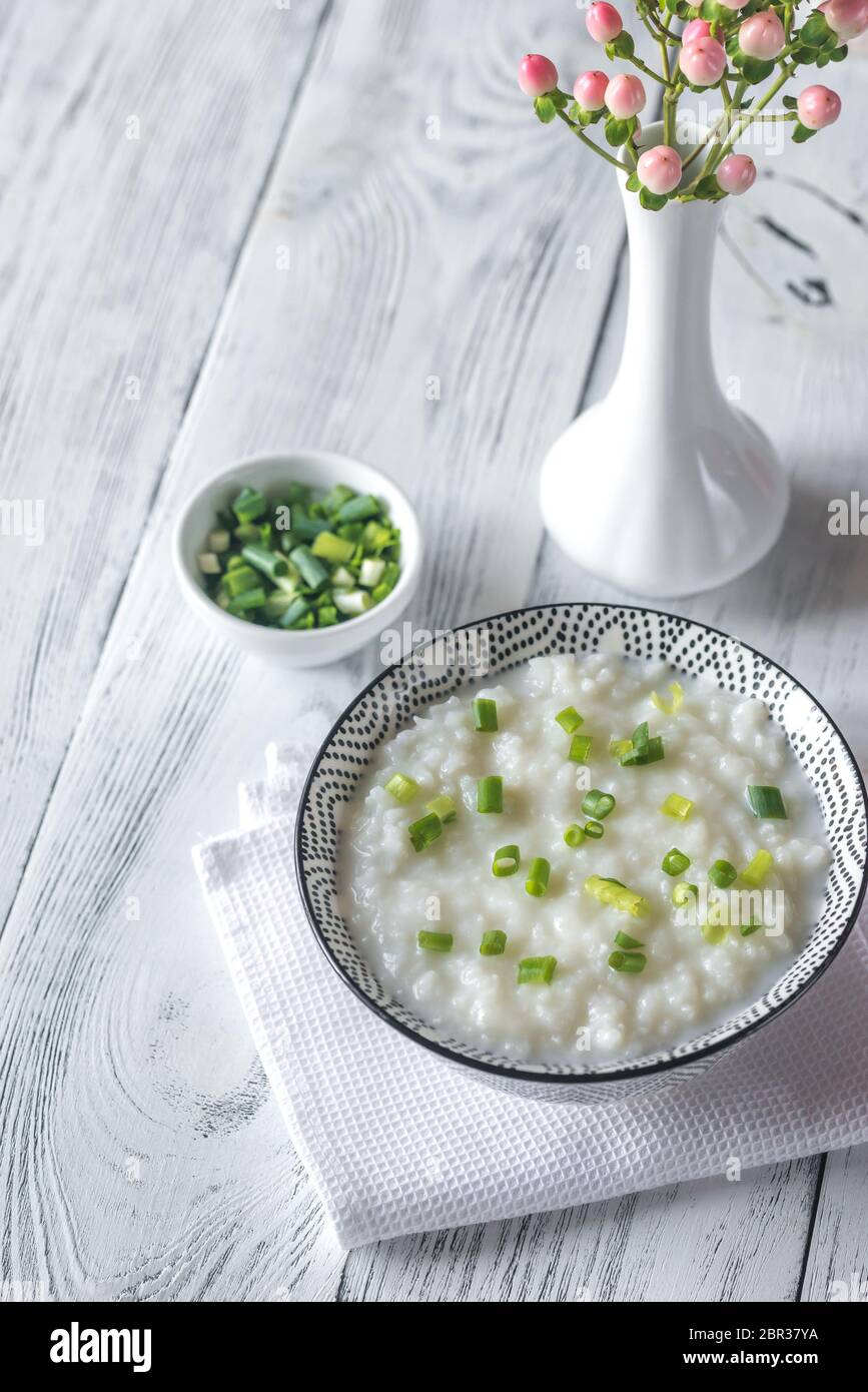 Bowl of congee - Asian rice porridge Stock Photo - Alamy