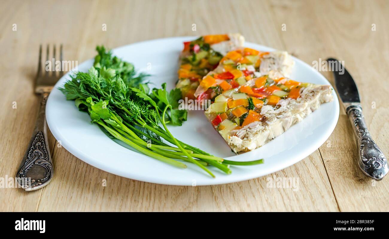 Chicken galantine with vegetables Stock Photo - Alamy