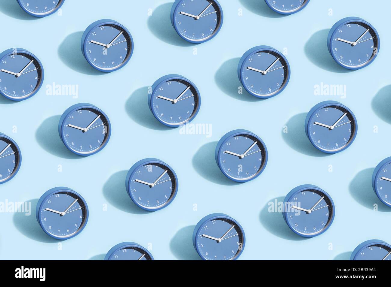 Trendy pattern made of blue clocks on pastel blue background Stock ...