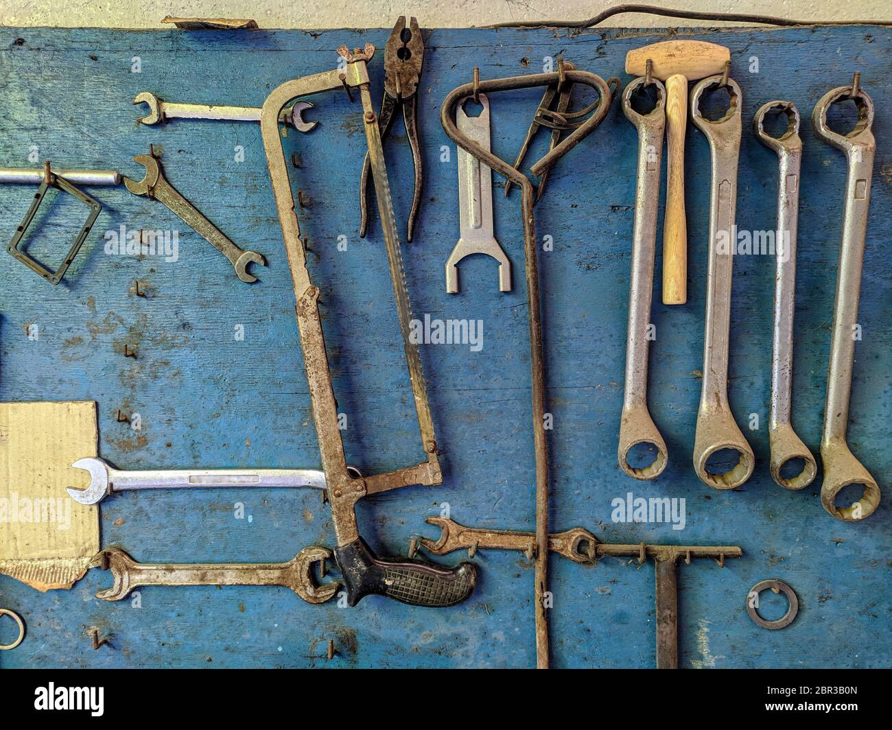 Bricolage tools showcase on a wall Stock Photo - Alamy