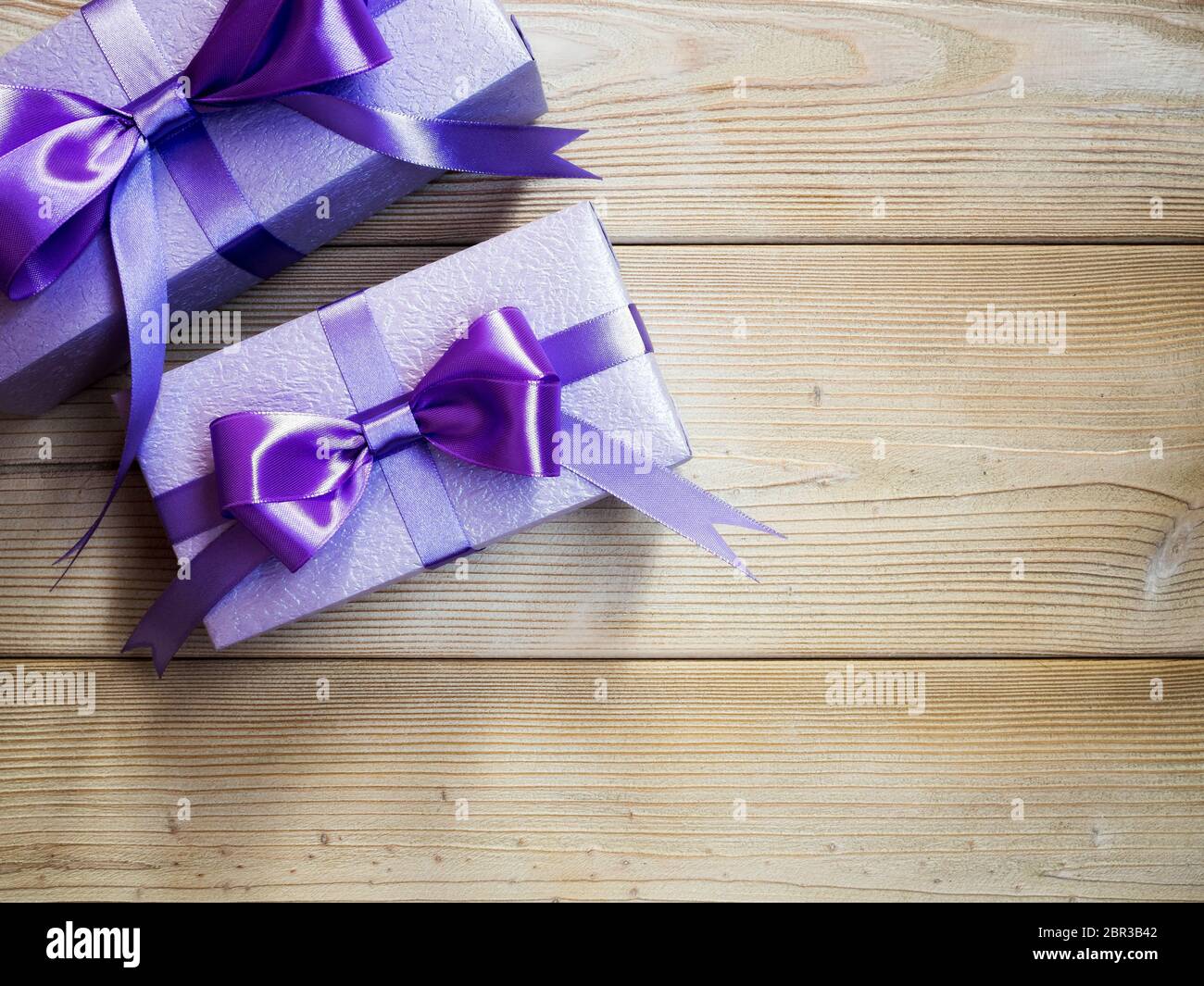 Composition of packed present boxes on wooden board. Celebrations ...