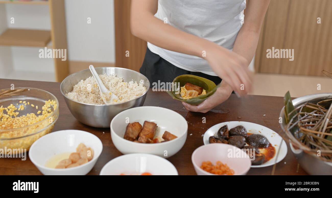 Woman rice dumpling home hi-res stock photography and images - Alamy
