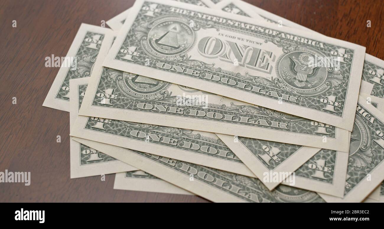 Counting USD banknote Stock Photo - Alamy