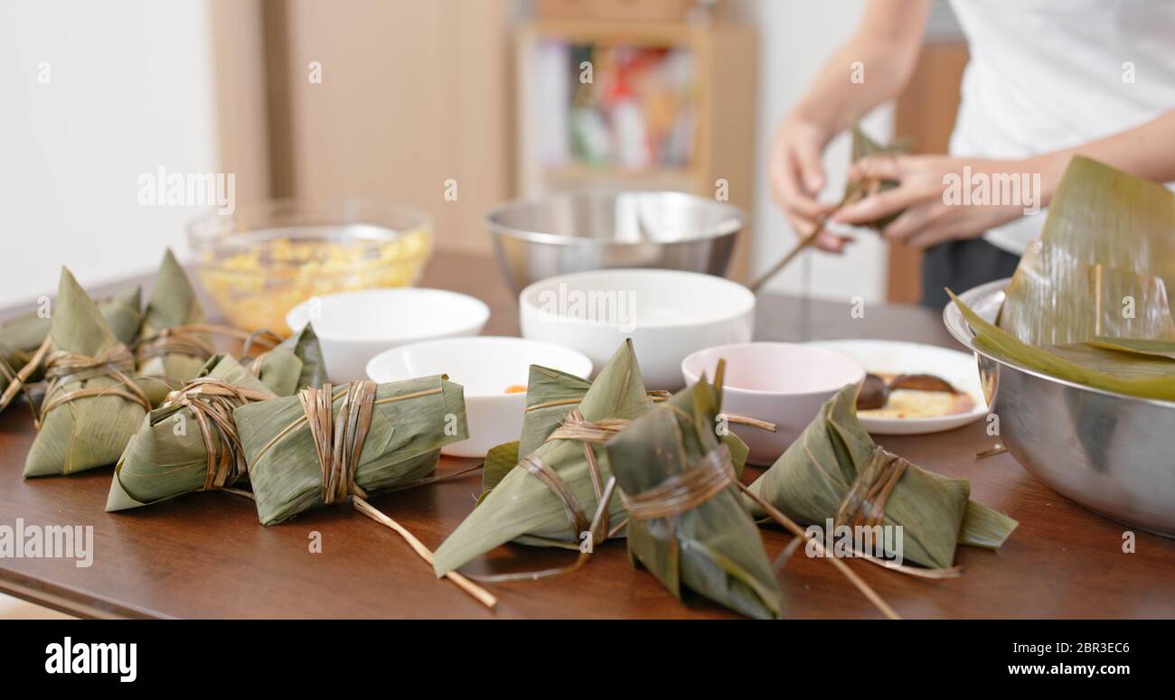 Make of stick rice dumpling Stock Photo - Alamy