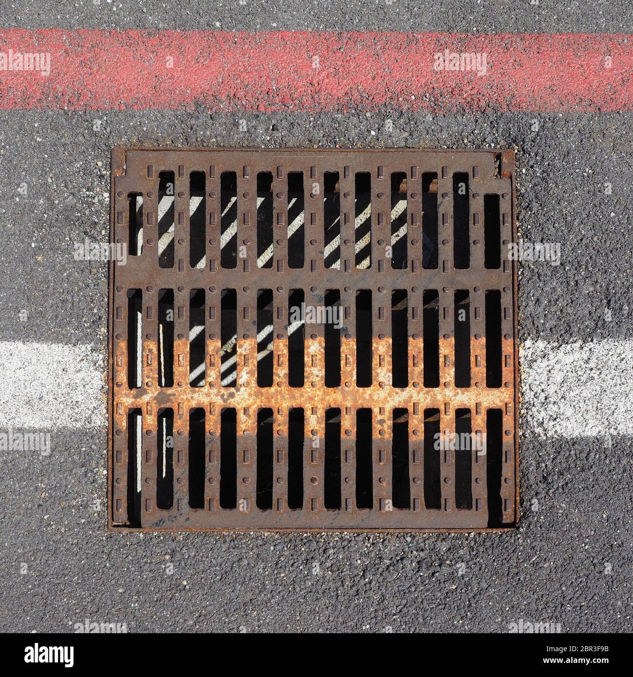 detail of a manhole in the street Stock Photo - Alamy