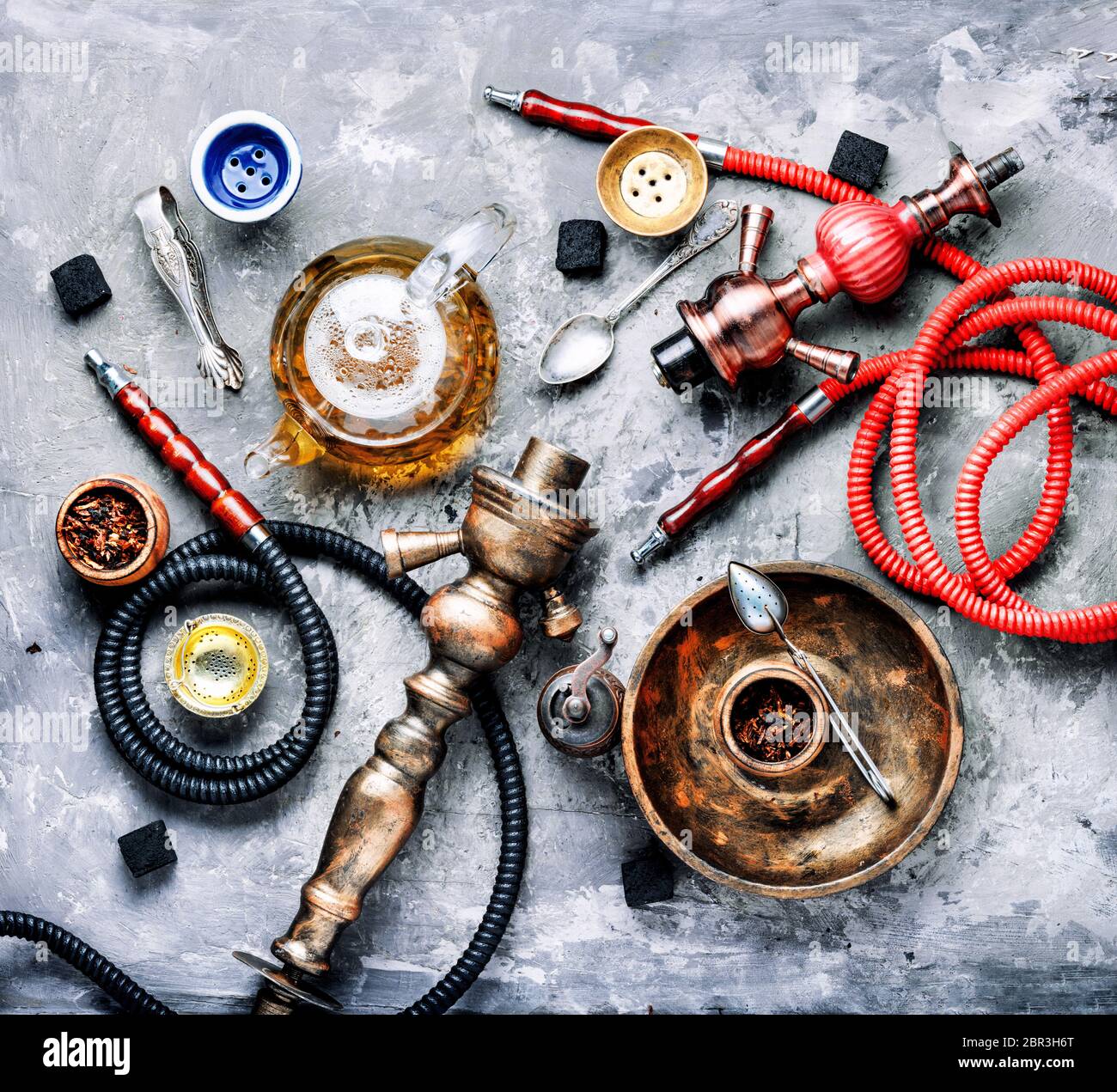 East smoking hookah. Arabian shisha with tea. Hookah and tea.Cooking ...