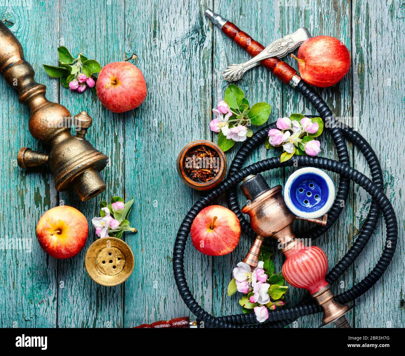 East smoking hookah. Arabian shisha with apple. Hookah and apple.Trendy ...