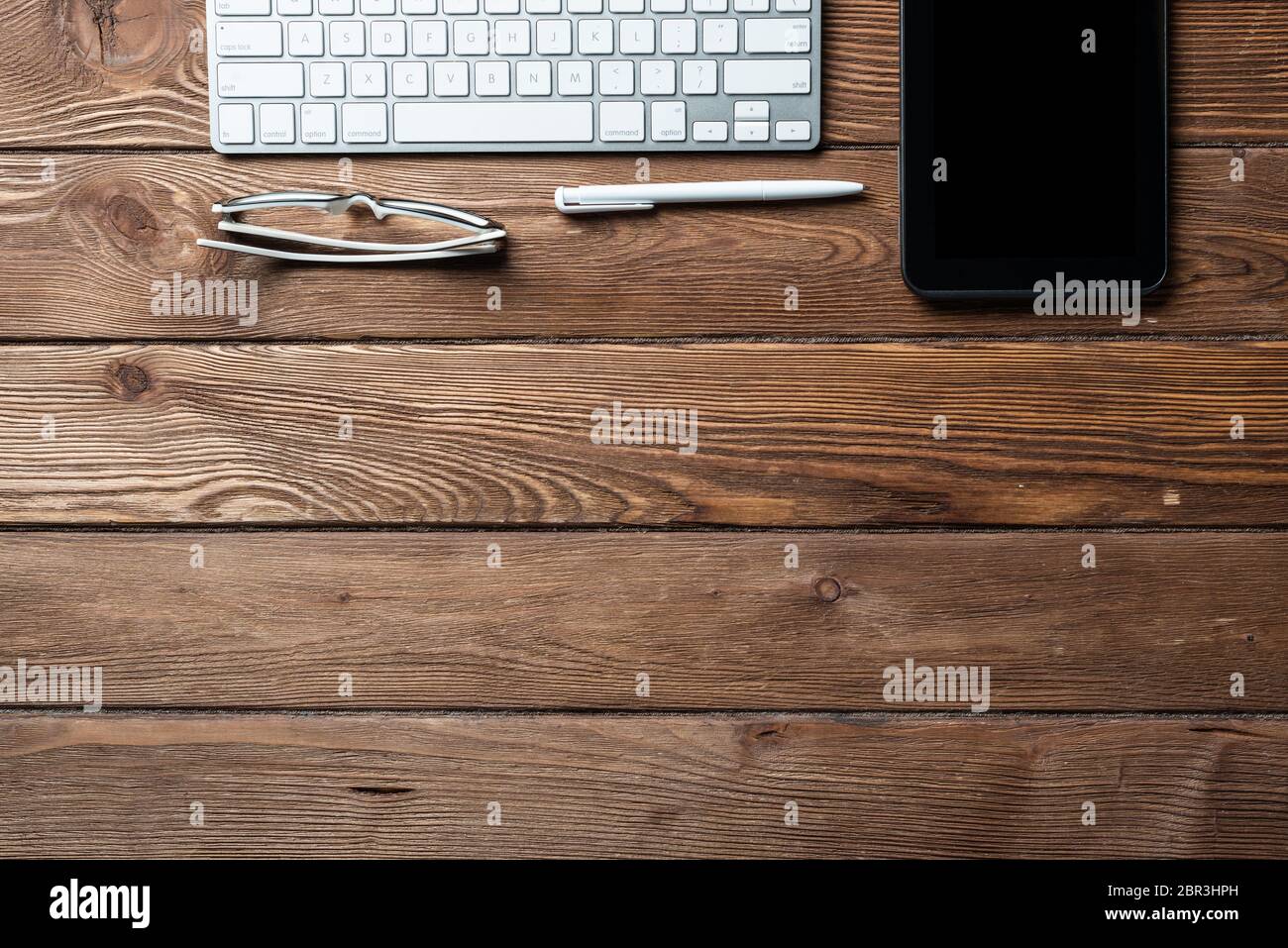 Top view of office workspace with gadgets Stock Photo - Alamy