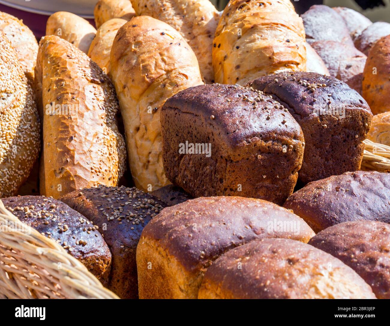 Fresh cereal bread and loaves with seeds Stock Photo - Alamy