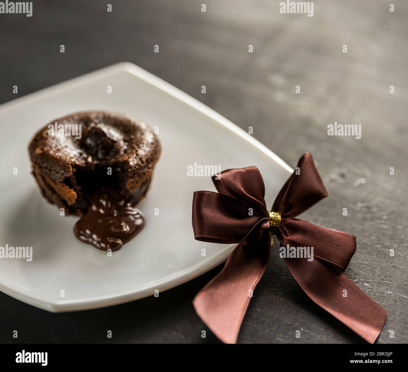 Fondant decorated with cocktail cherry Stock Photo - Alamy