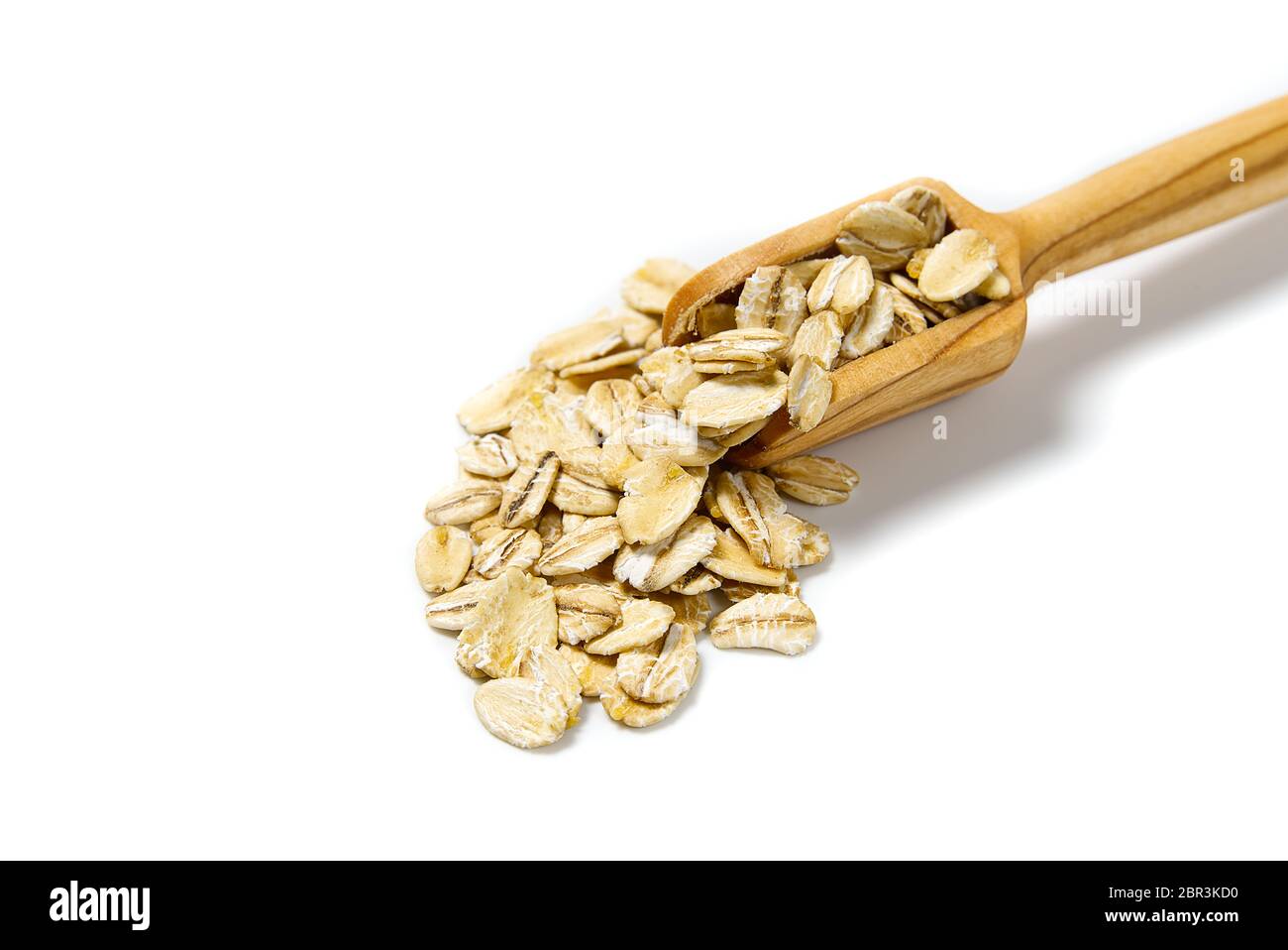 Eco oatmeal in wooden spatula isolated on white background. I Love ...