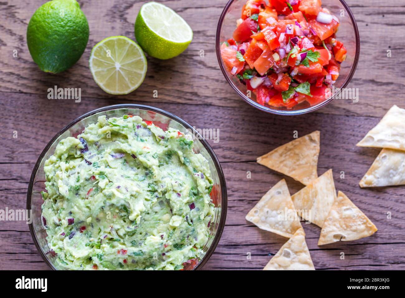 Bowls of guacamole and salsa Stock Photo - Alamy