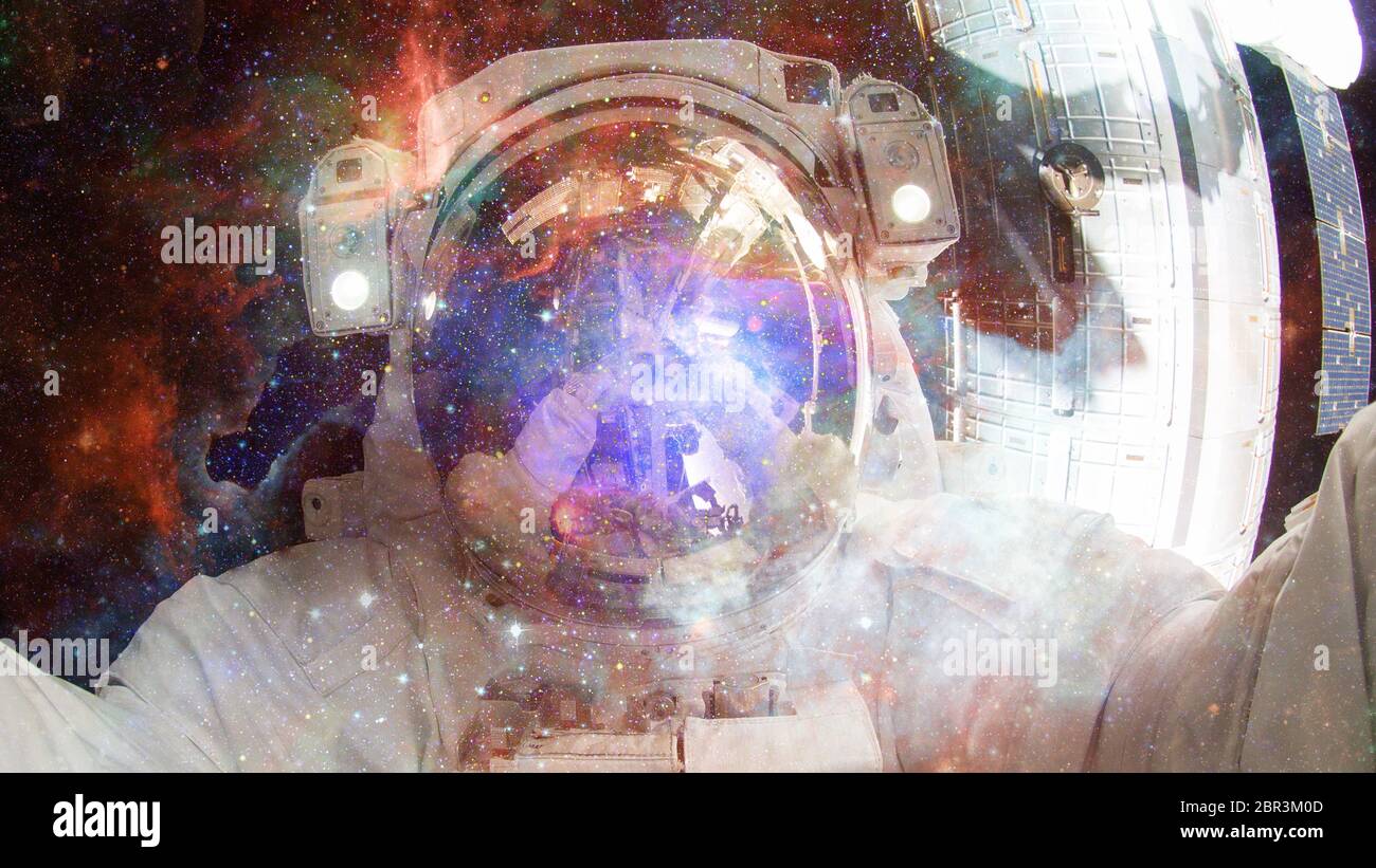 Astronaut in outer space. Science fiction art. Elements of this image ...