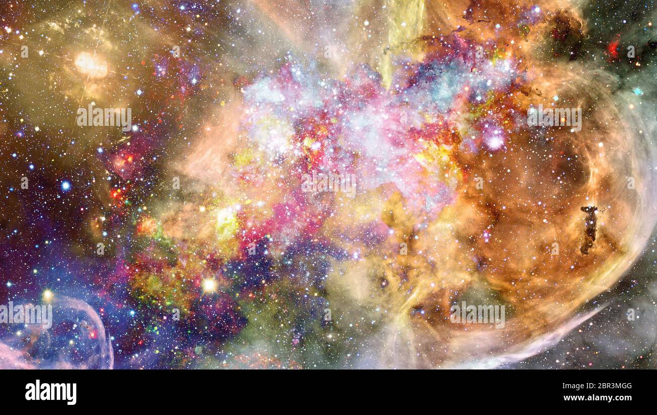 Colored clouds in nebula. Combined version of Hubble space telescope ...