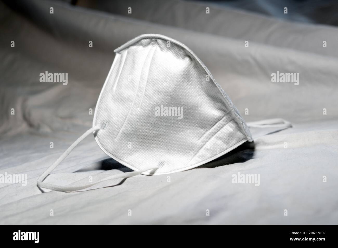 White face mask against viruses and other polluting pathogens in the ...