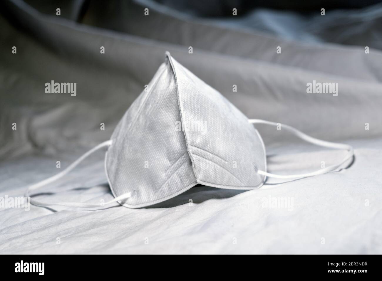 White face mask against viruses and other polluting pathogens in the ...