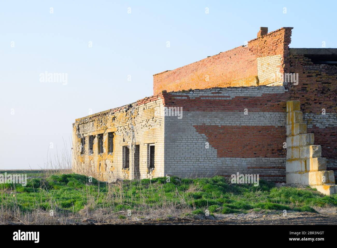 Old soviet brick abandoned building. Collapsing brick construction ...