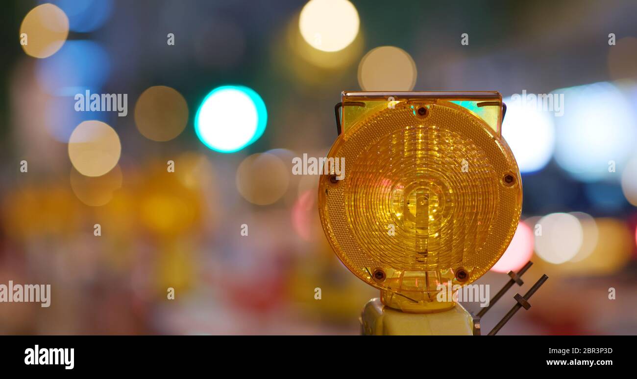 Yellow caution light Stock Photo - Alamy